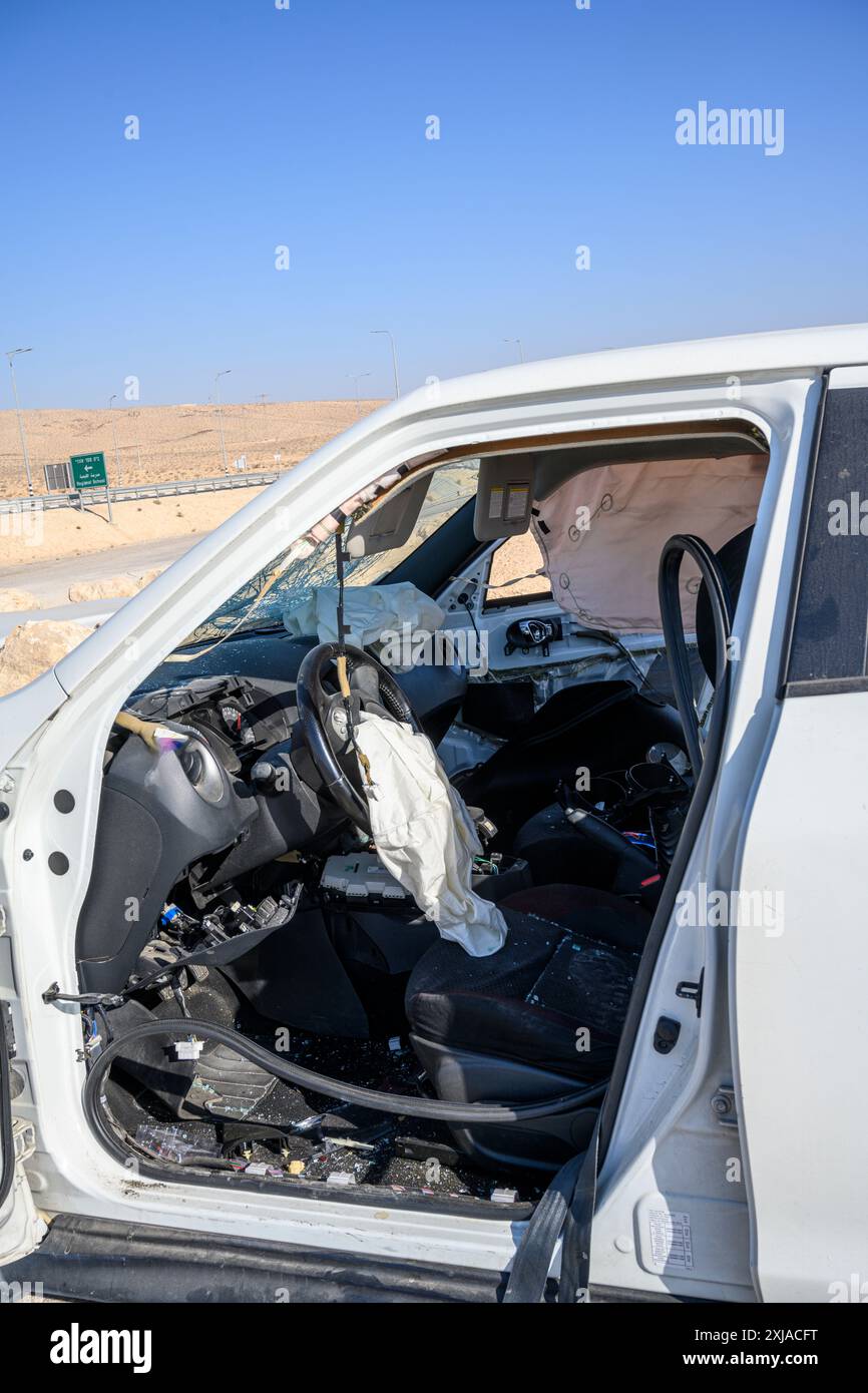 Abandoned car stripped of most parts after being left on the side of ...