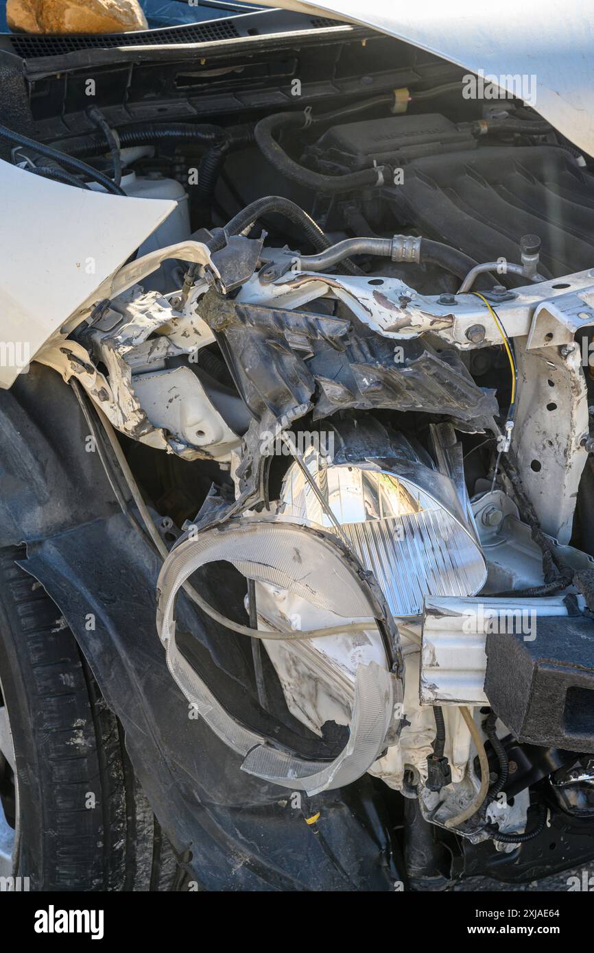 Abandoned car stripped of most parts after being left on the side of ...