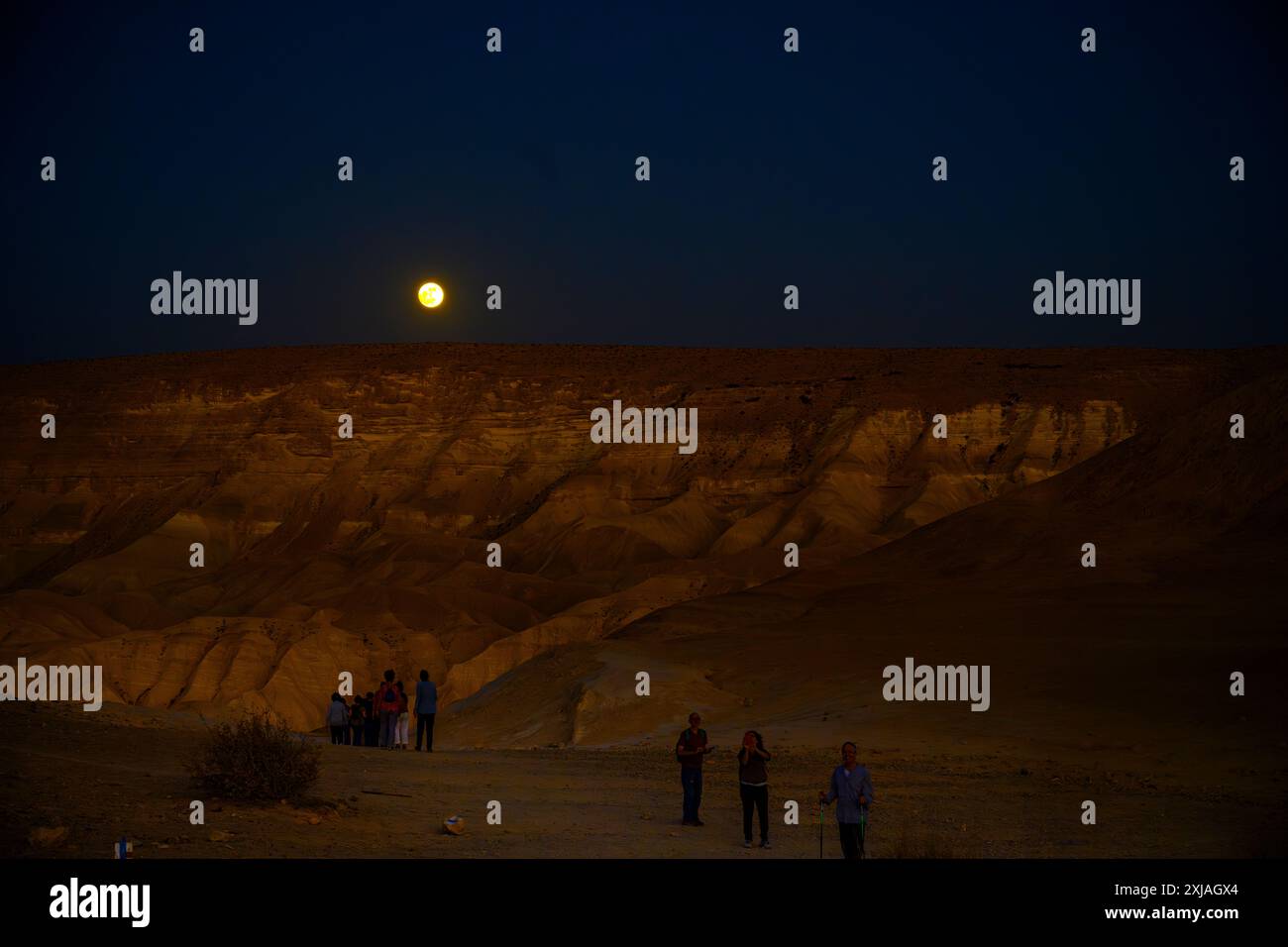 full moon moon rising over the Negev Desert landscape Photographed at Havarim stream (Near ...