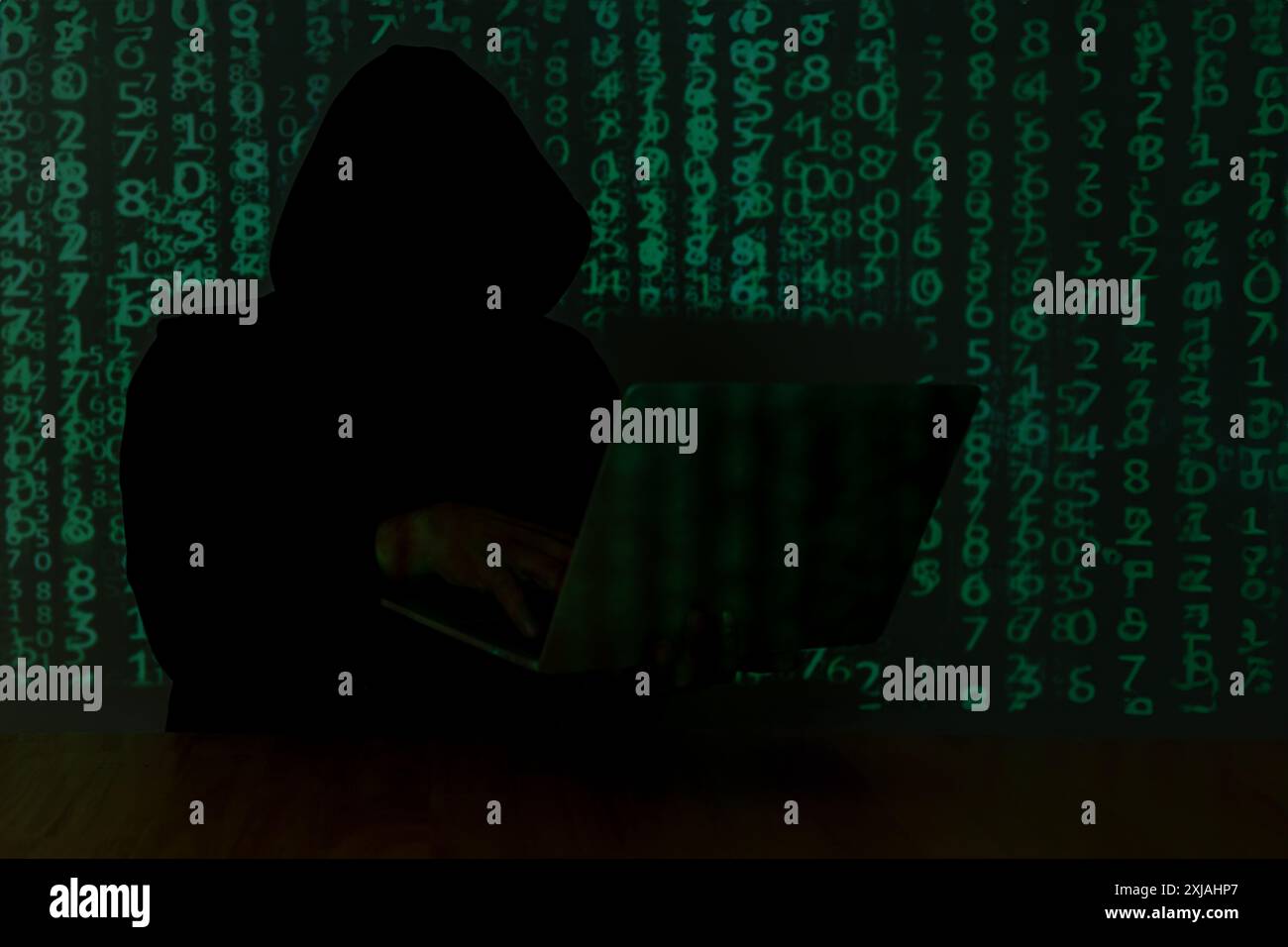 A man in black is hacking personal computer data, representing the ...