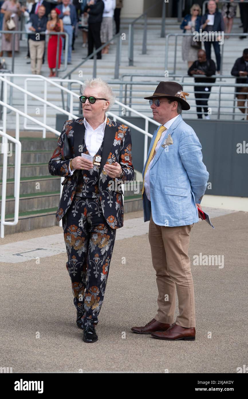 Ascot, UK. 12th July, 2024. Steve Edge (R) enjoying the horse racing at ...