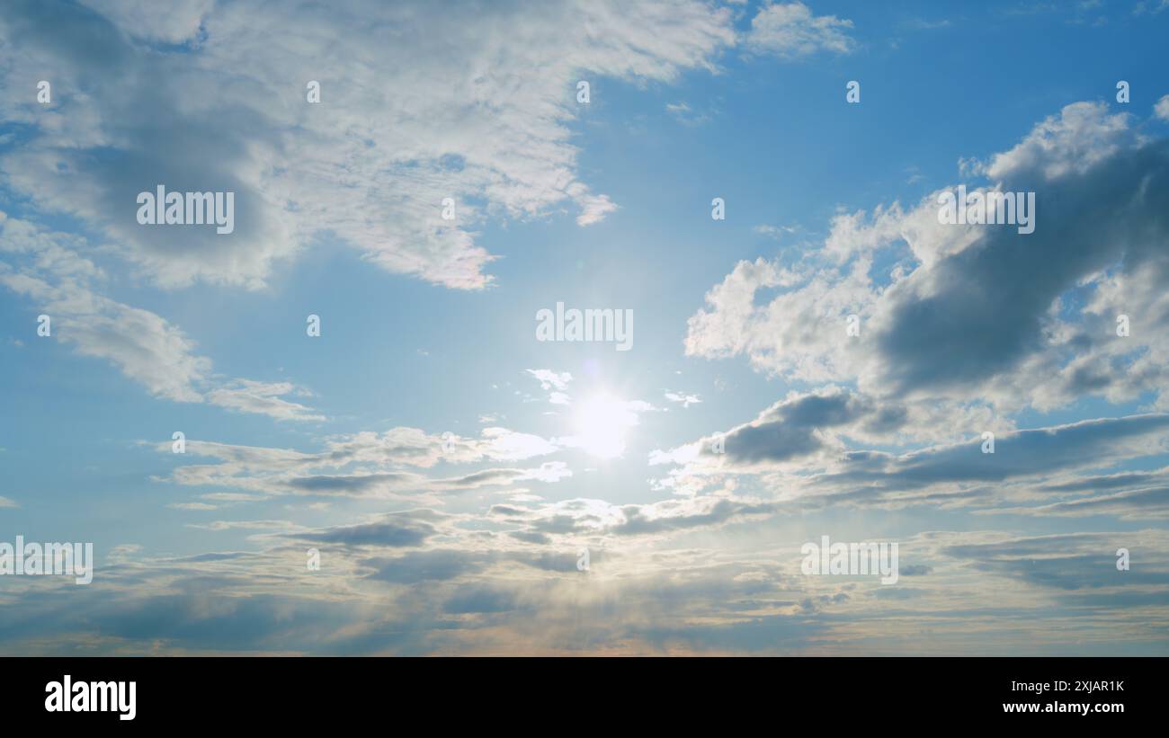 Timelapse. Beautiful sunny blue sky with bright sun light shining ...