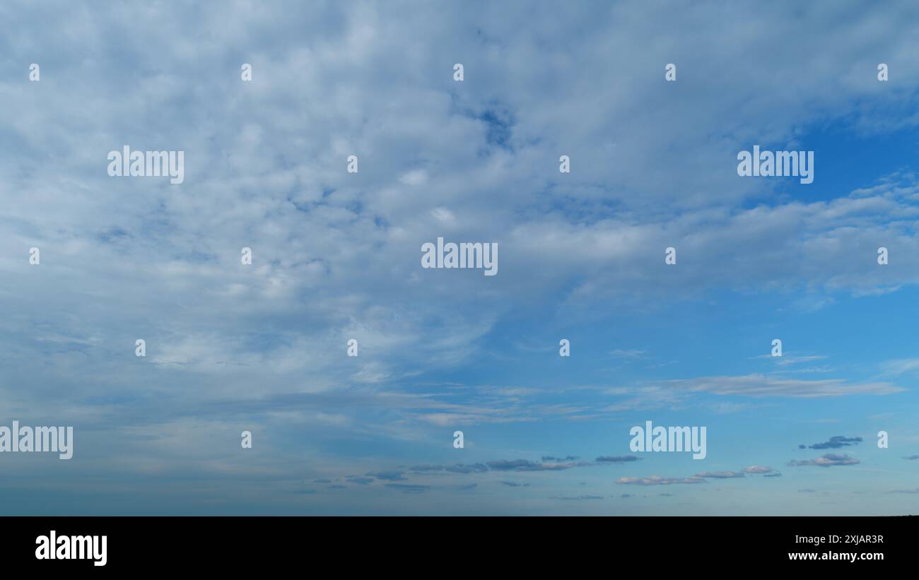 Timelapse. Solar energy concept of bright sun ray. Building clouds and ...