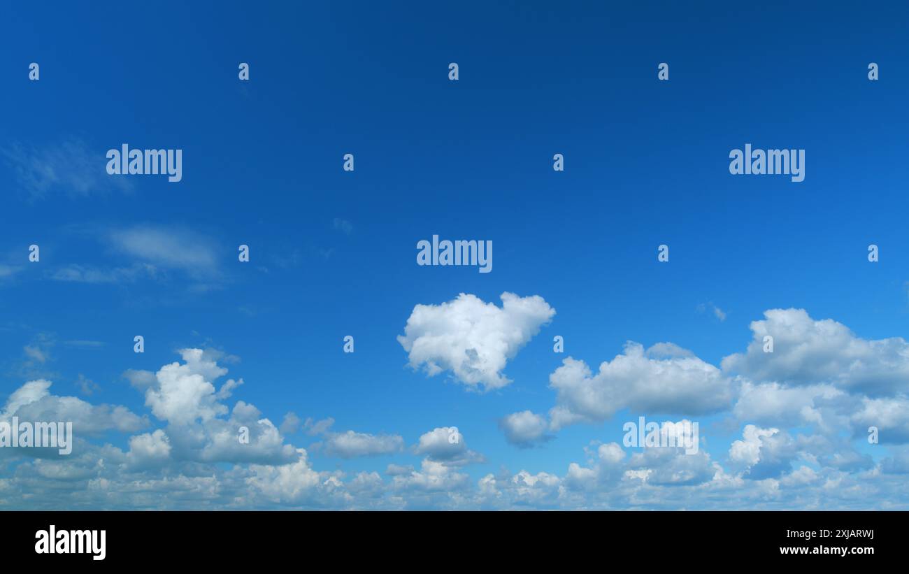 Time lapse. Bright clear skywith beautiful layered cloudscape. Nature ...