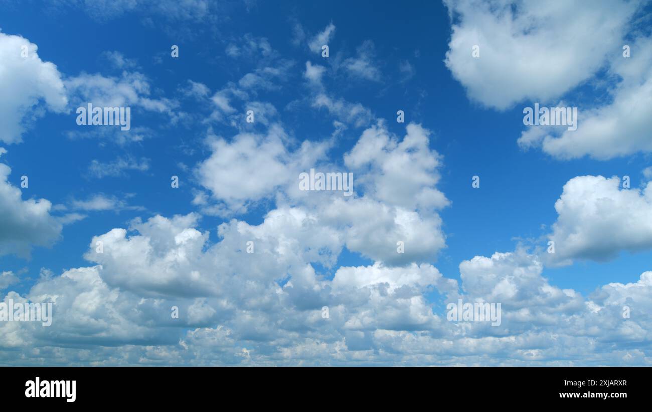 Time lapse. Fluffy clouds sky atmosphere. Puffy fluffy white clouds. Cloud sky scape Stock Photo ...