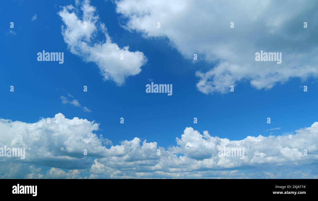 Time lapse clouds drifting across hi-res stock photography and images ...