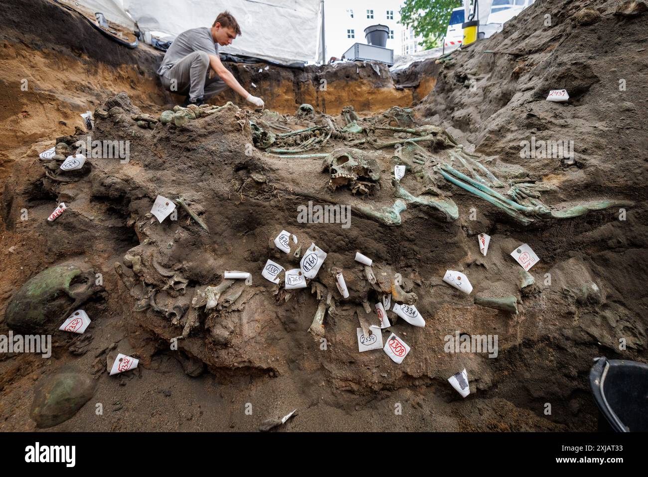 Nuremberg, Germany. 17th July, 2024. An archaeologist uncovers the ...