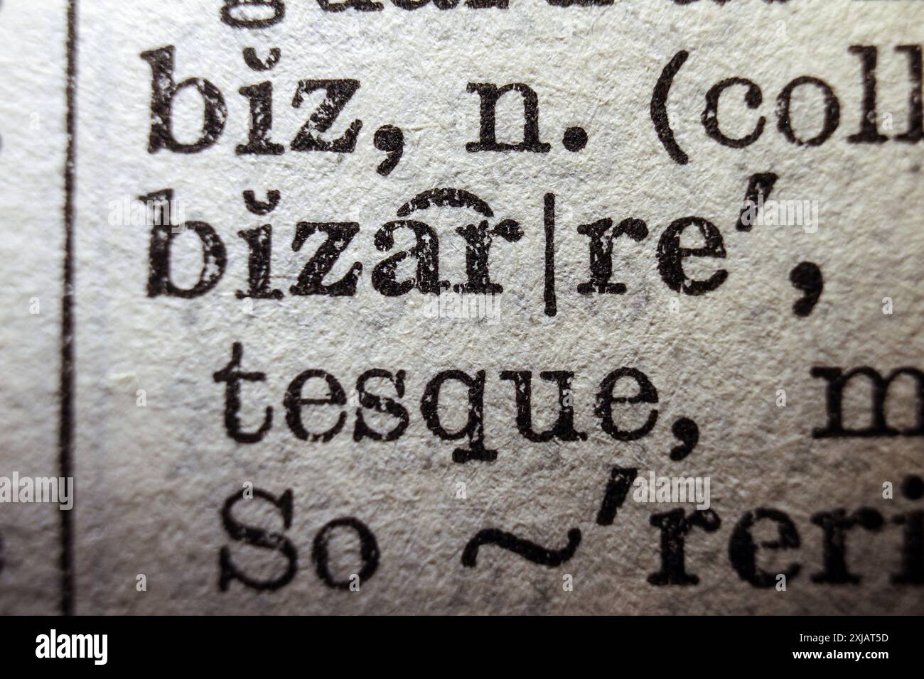 Word bizarre on dictionary hi-res stock photography and images - Alamy