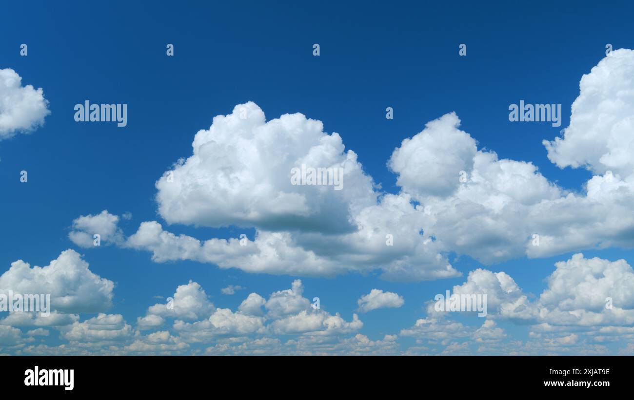 Time lapse. Puffy fluffy white clouds. Forming cloud moving with blue sunny, summer skies Stock ...