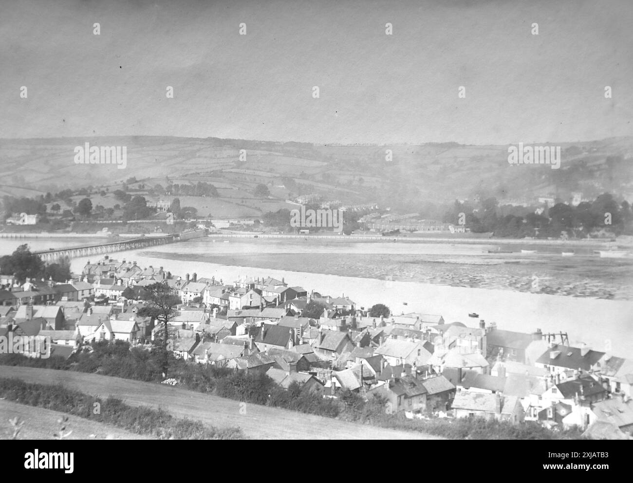 Landscape showing houses built closely together and a river with a ...