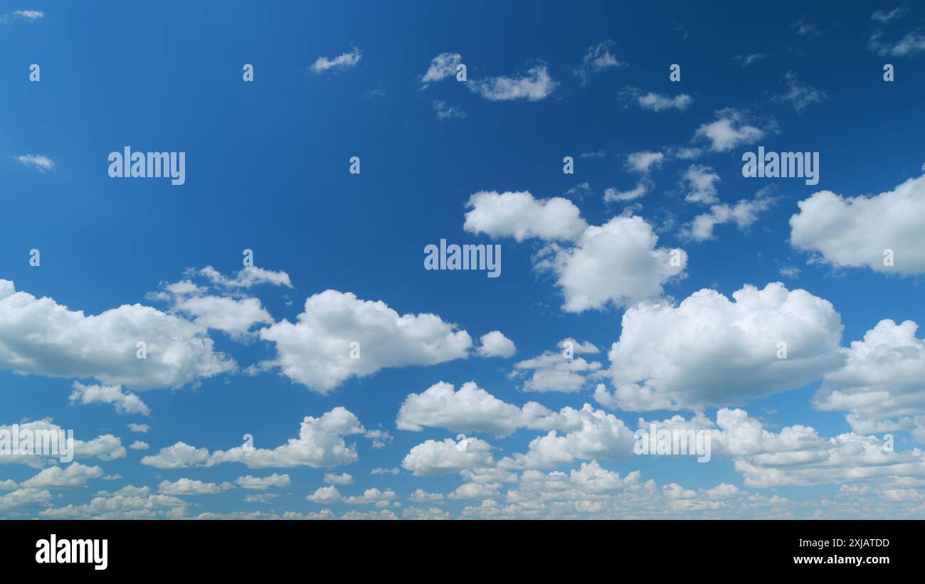 Time lapse. Blue sky white puffy fluffy clouds billow in high space. Sky with clouds weather ...