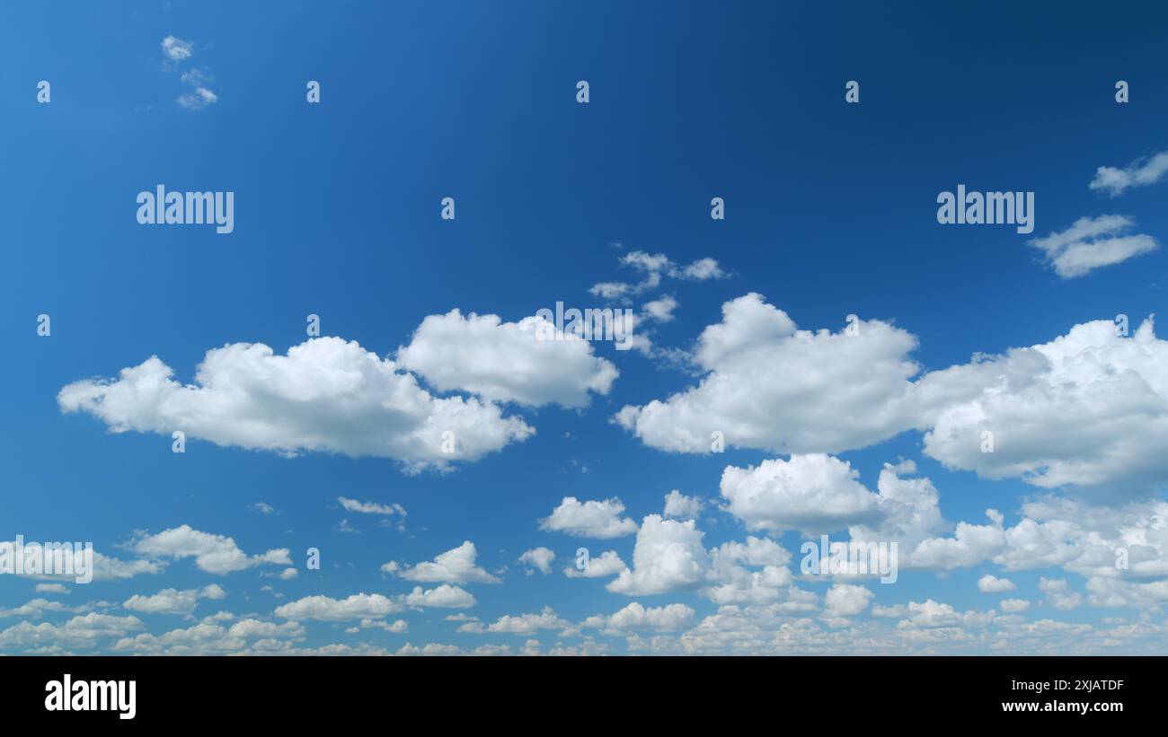 Time lapse. Blue sky with copyspace background with forming clouds in ...
