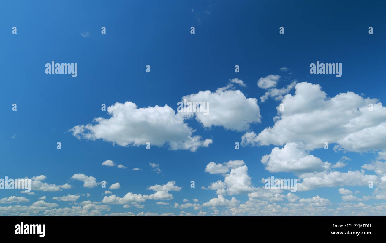 Time lapse. Summer blue sky and white clouds background. Layers of ...