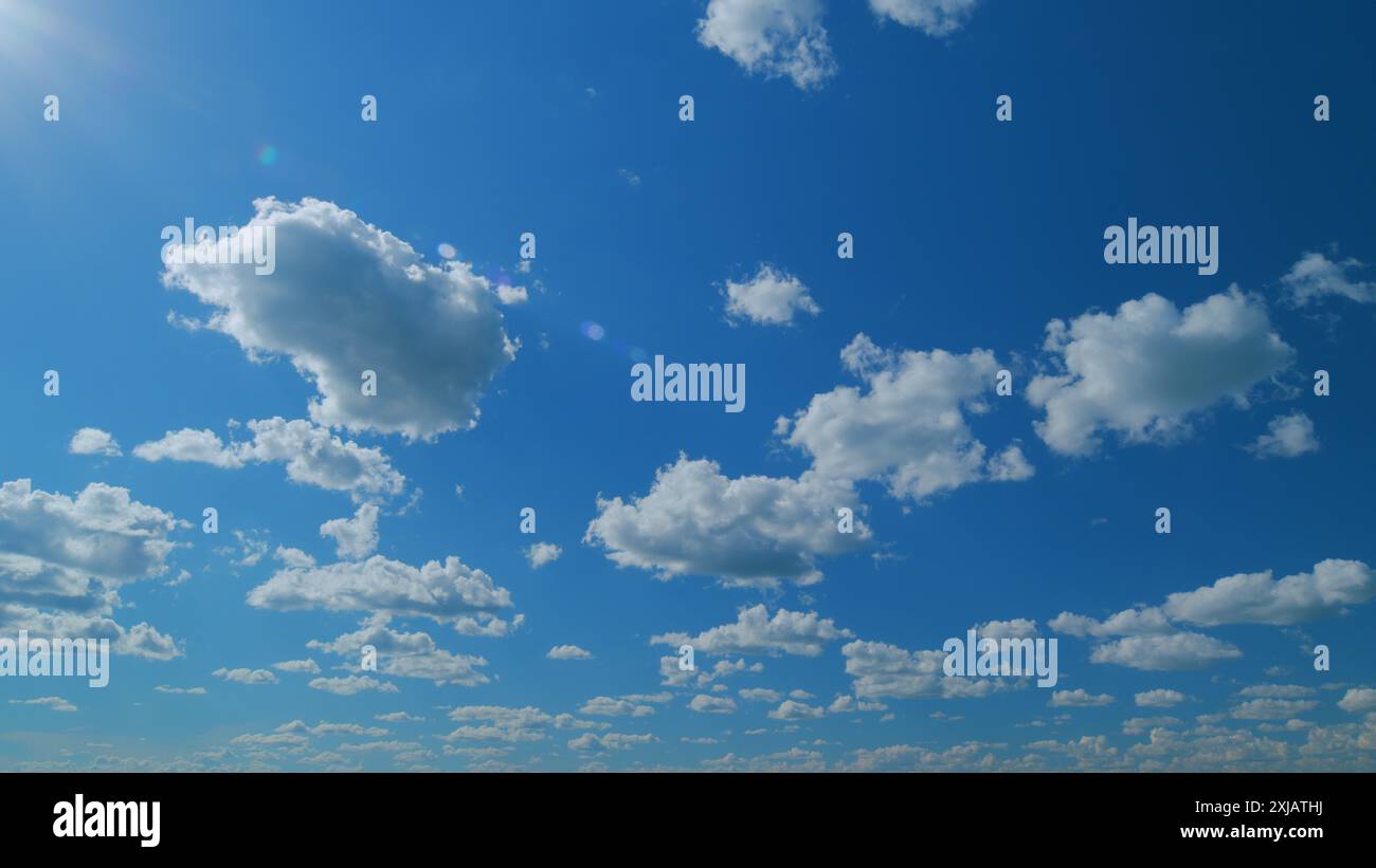 Time lapse. Cloud cloudscape. Puffy fluffy white clouds. Nature weather ...