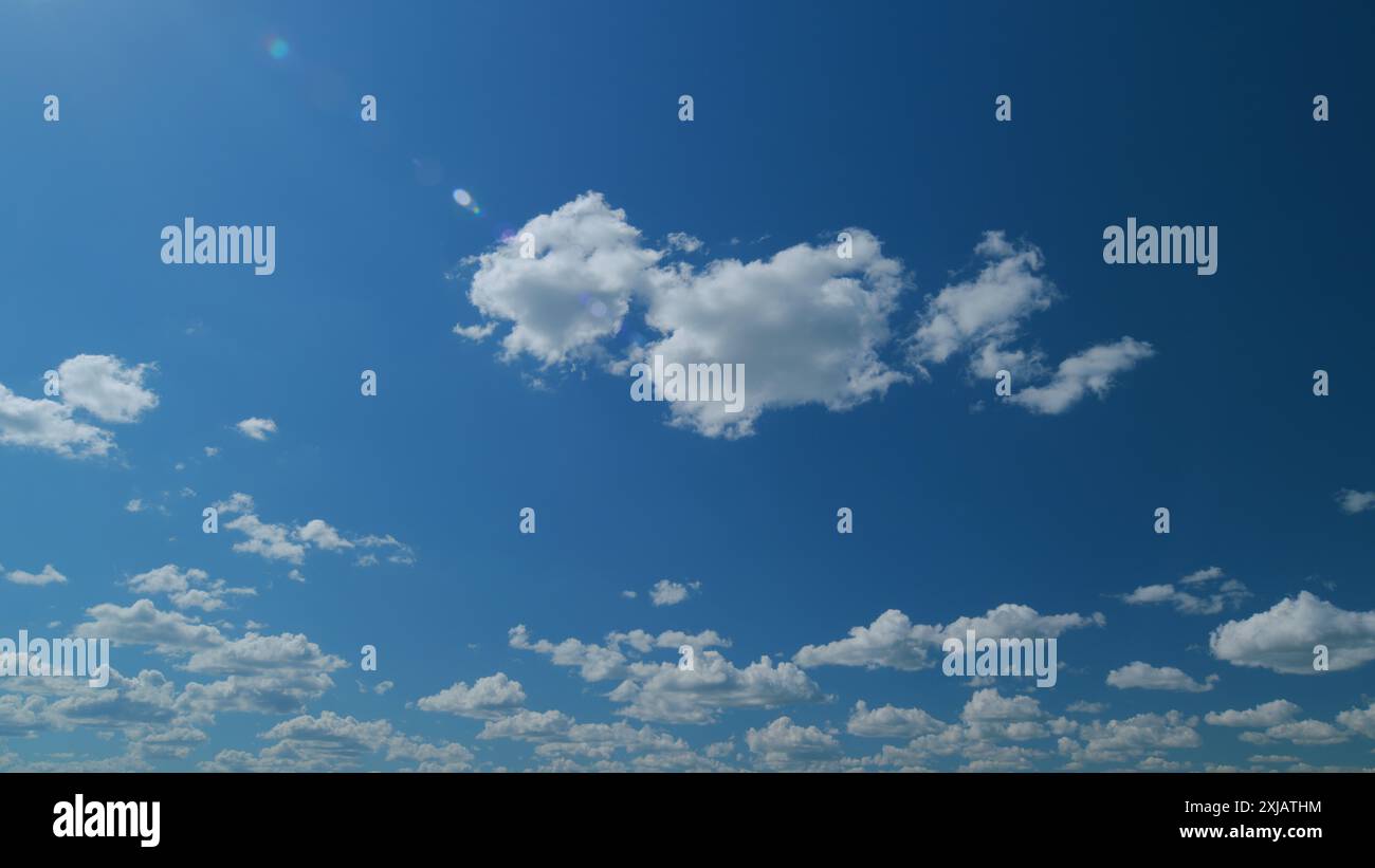 Time lapse. Blue sky with copyspace background with forming clouds in ...