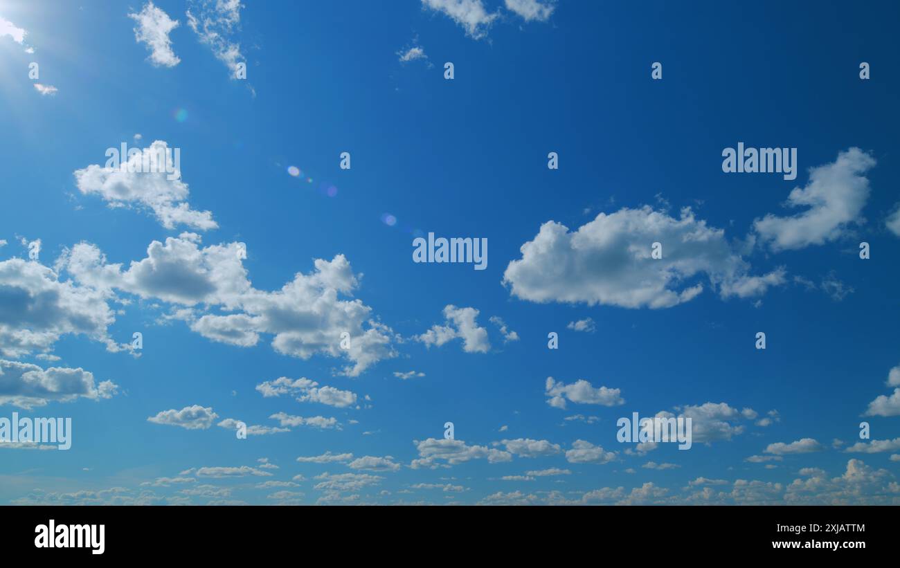 Time lapse. Fluffy clouds sky atmosphere. Puffy fluffy white clouds. Cloud sky scape Stock Photo ...