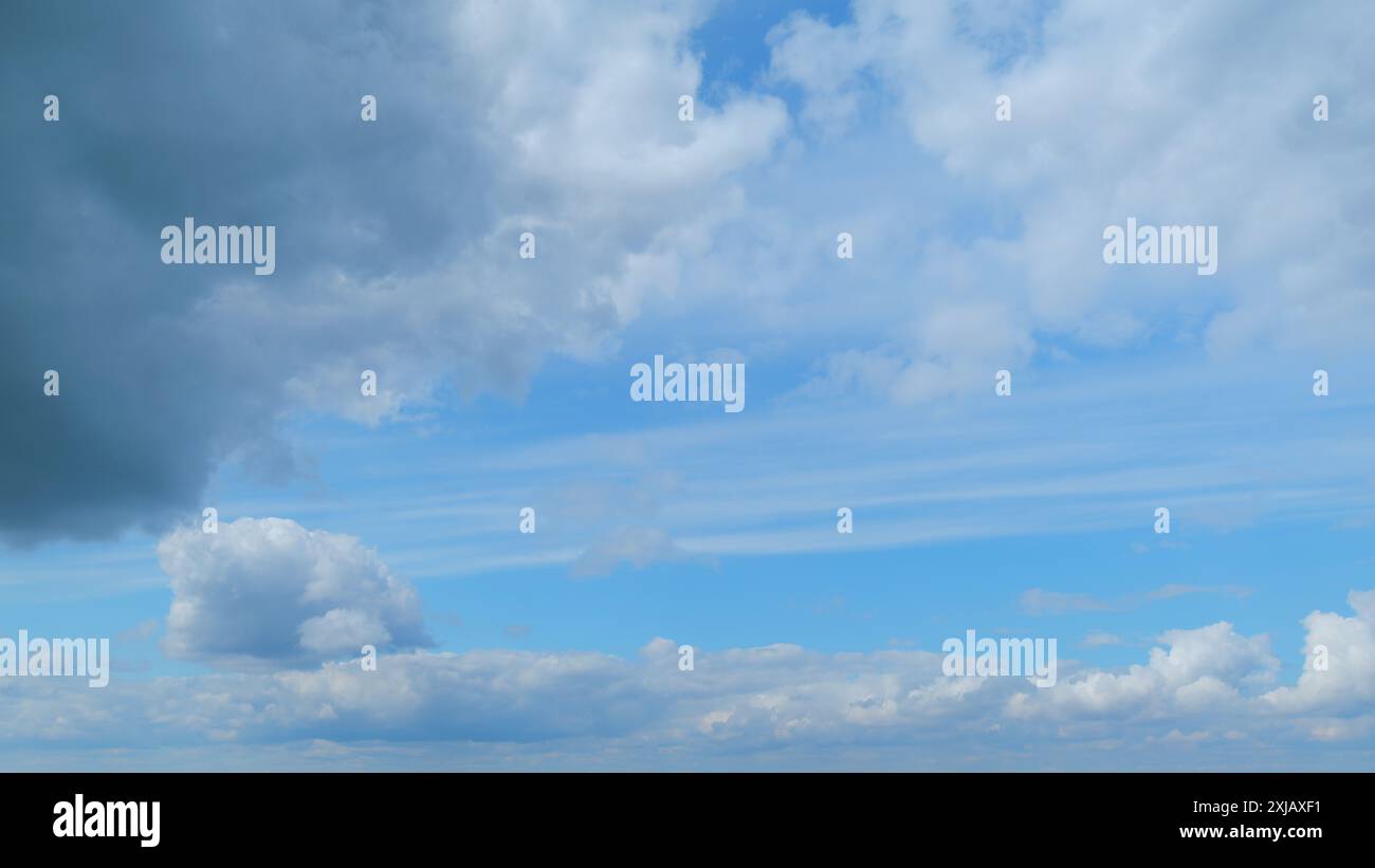Time lapse. Formation cloud sky scape. Various layers of clouds move in ...