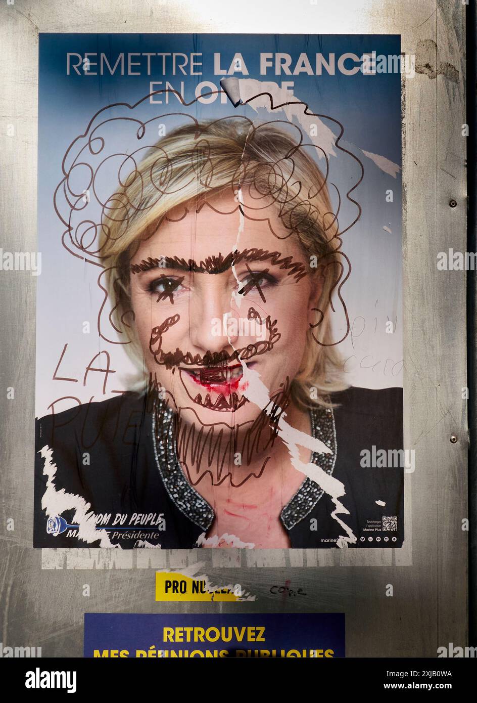 Defaced 2017 French Presidential election poster of Marine le Pen Stock ...