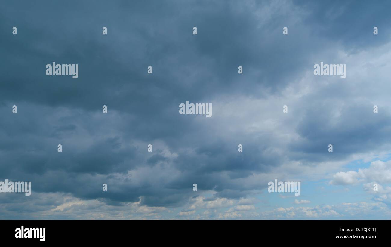 Cumulus rain clouds in motion hi-res stock photography and images - Alamy