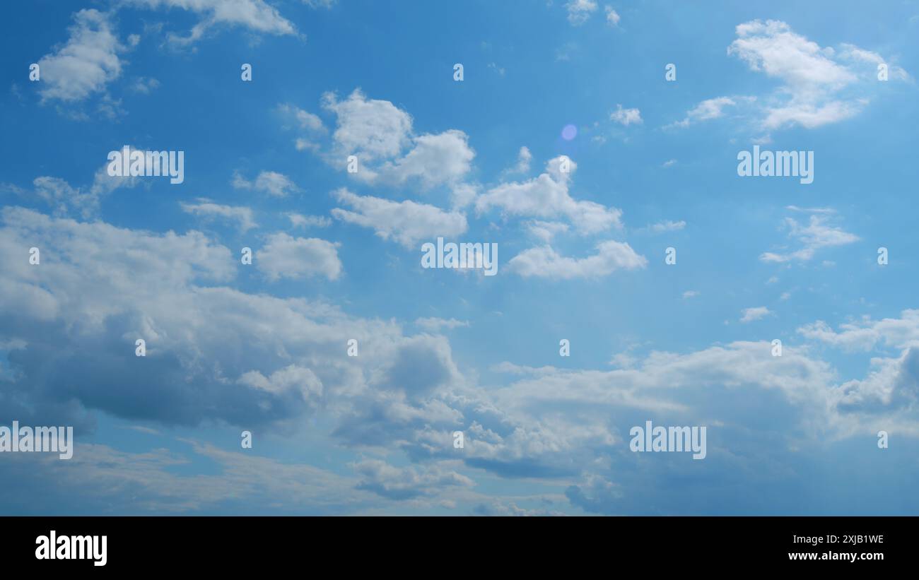 Time lapse. Building of a large white cloud in the blue sky. Clouds ...