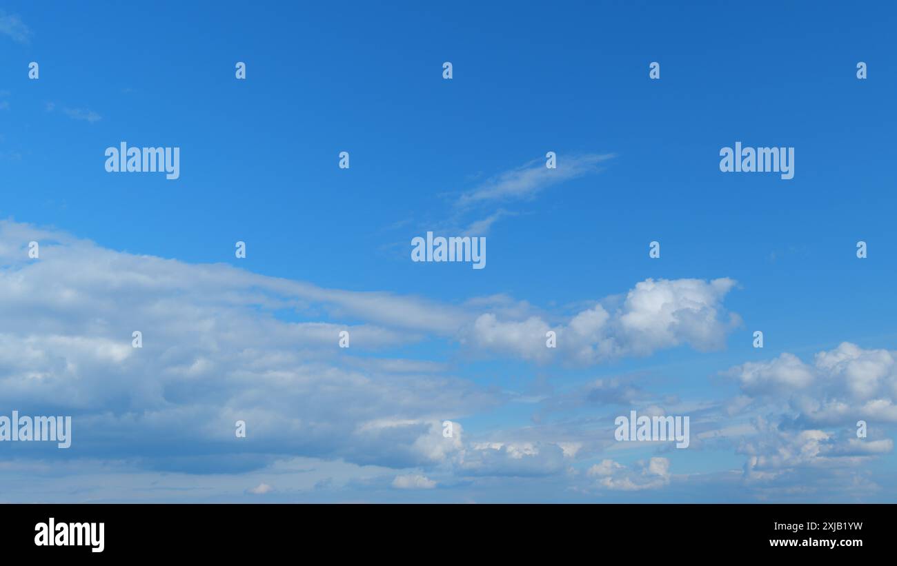 Time lapse. Soft white clouds moving on blue sky background. Tropical ...