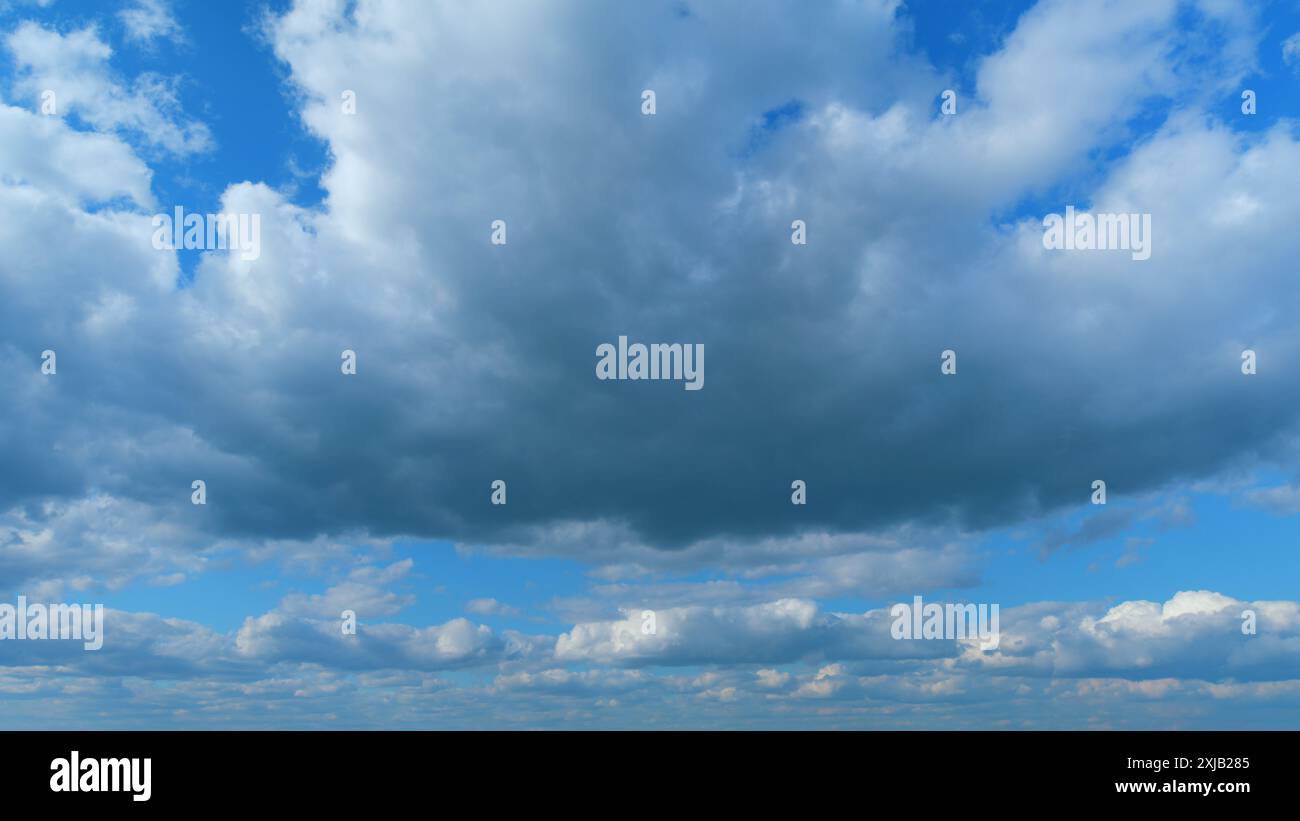 Time lapse. Sky and dark cloud. Beautiful sunny blue sky with rain ...