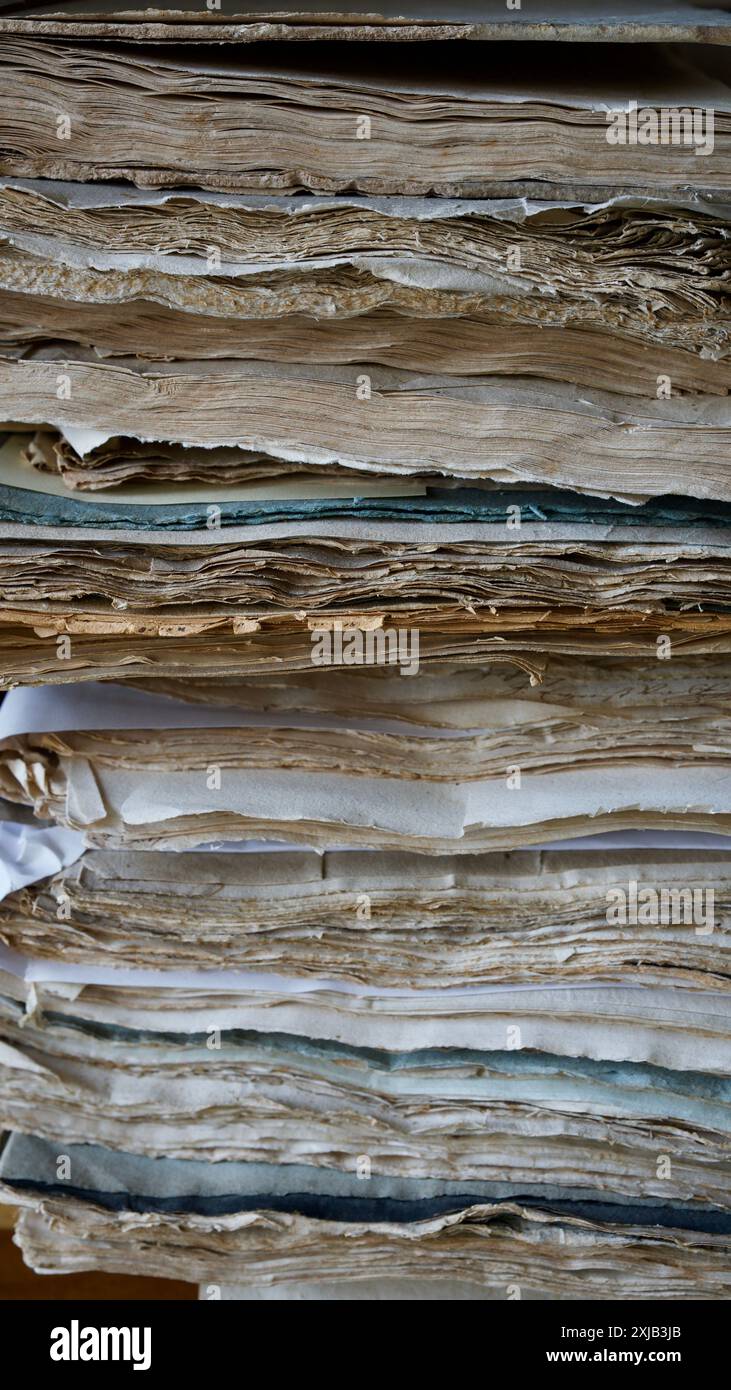 A pile of old documents in an archive Stock Photo - Alamy