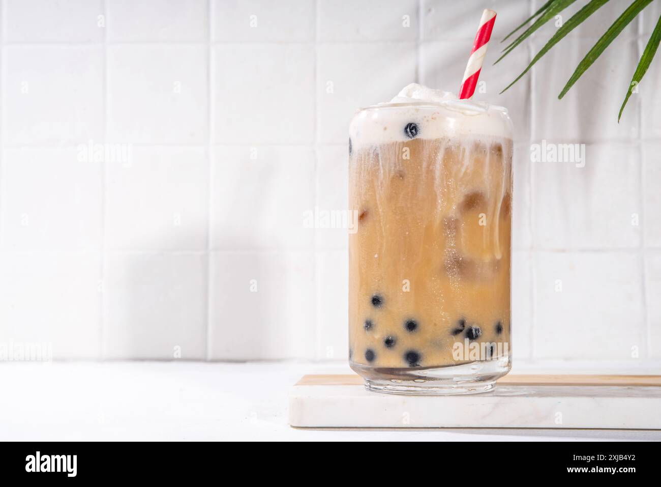 Classic boba bubble tea with tapioca pearls and whipped non-dairy ...