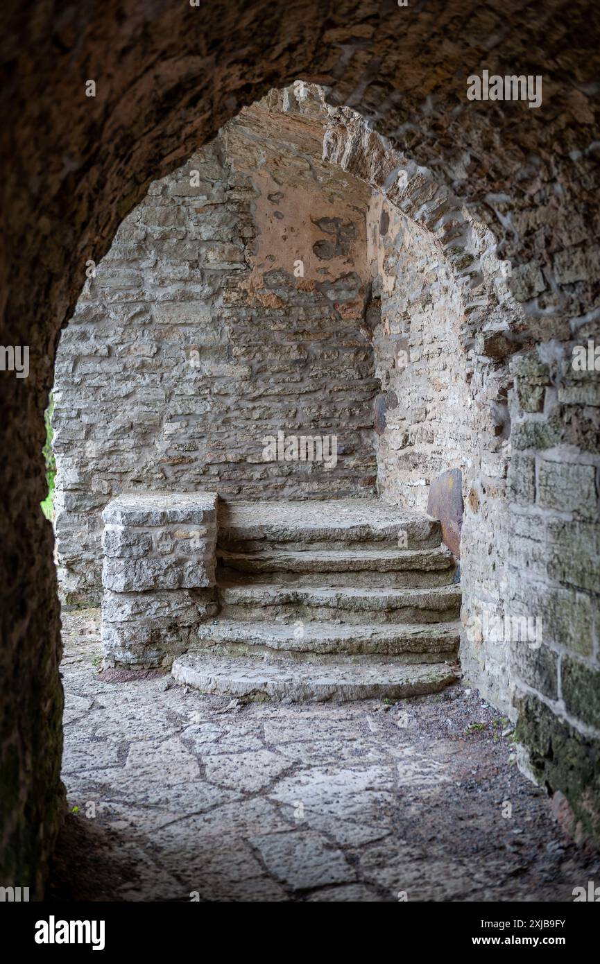 Arched passage of the ruined monastery leading to the steps. Ruined St ...