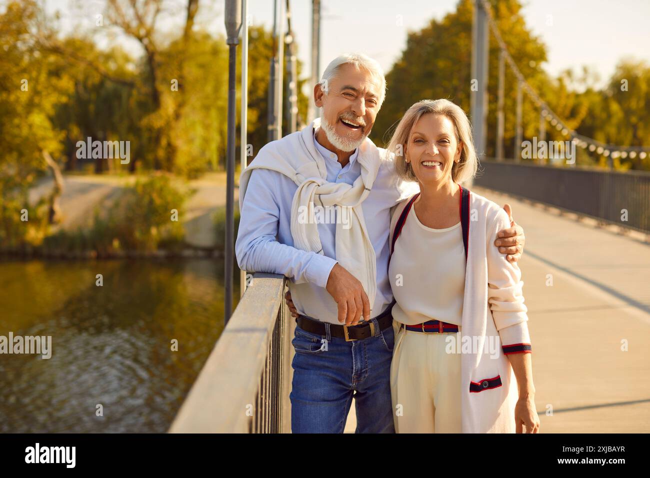 Senior couple walk in park hi-res stock photography and images - Alamy