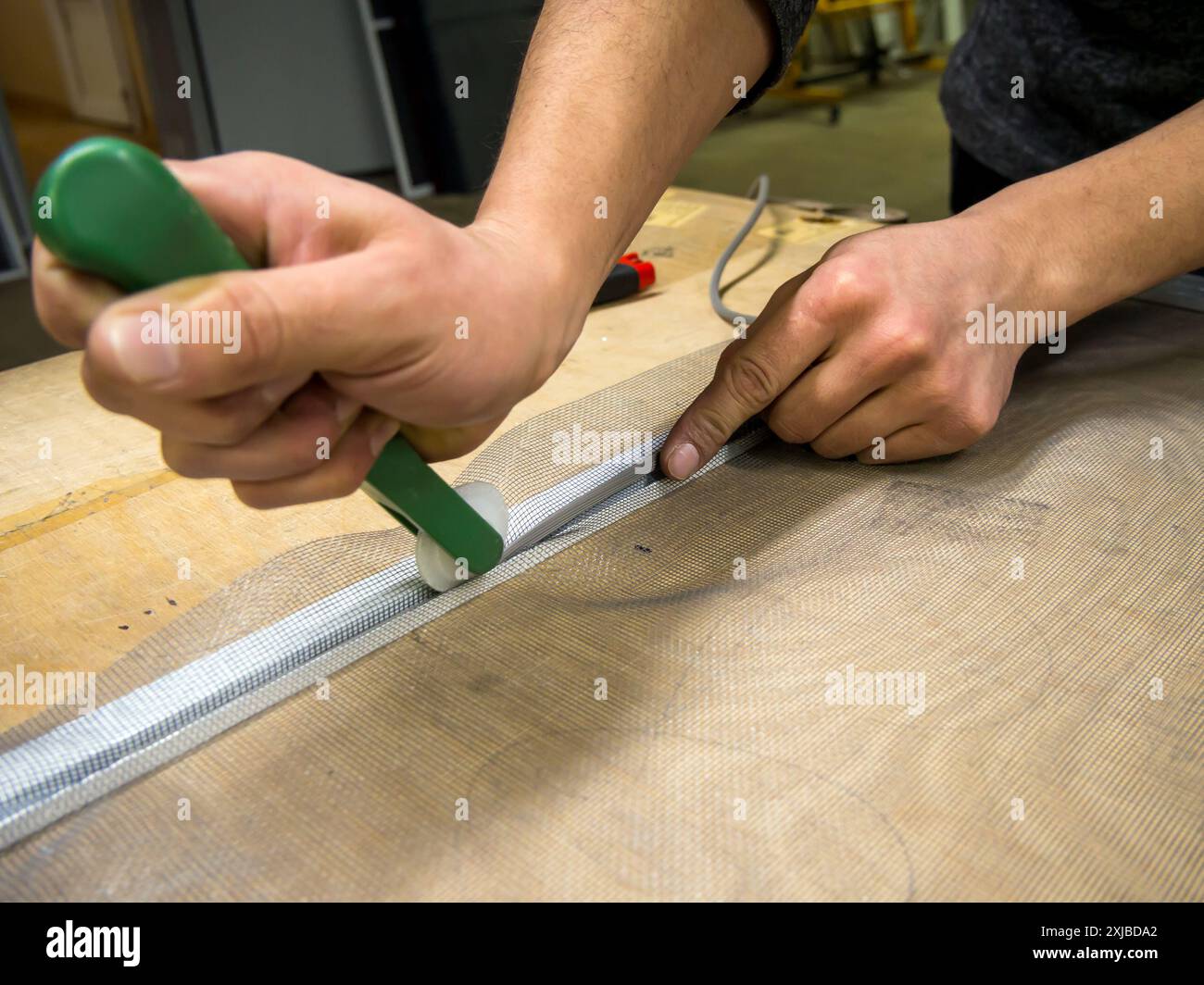 Stretch the mosquito net and secure it with a cord Stock Photo - Alamy