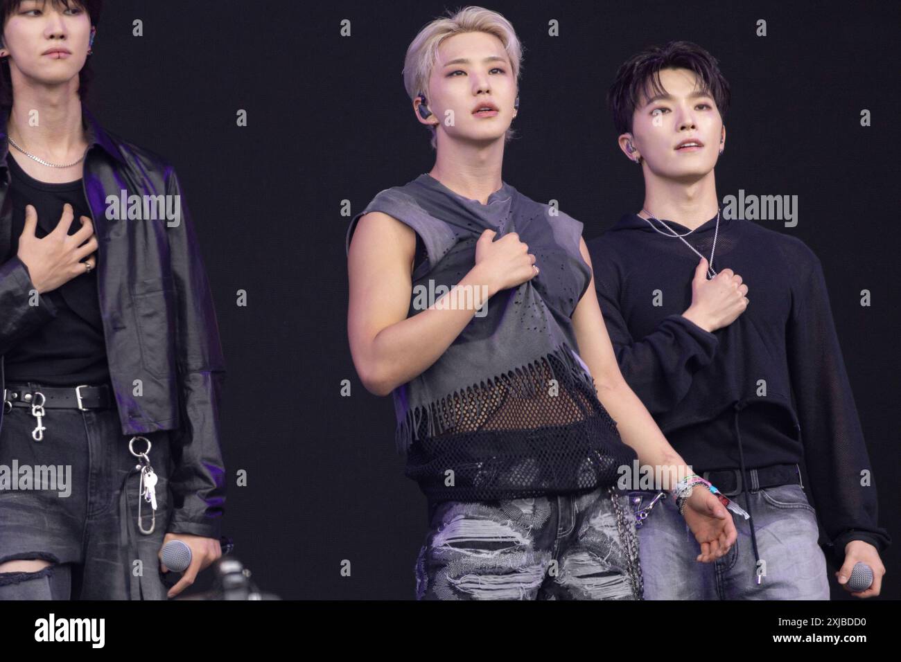 Hoshi, centre, of K pop band, Seventeen, performs with the band during ...