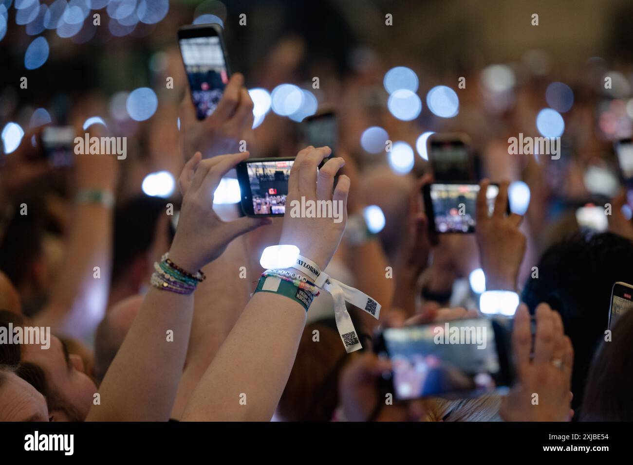 Gelsenkirchen, Germany. 17th July, 2024. Spectators film with their ...