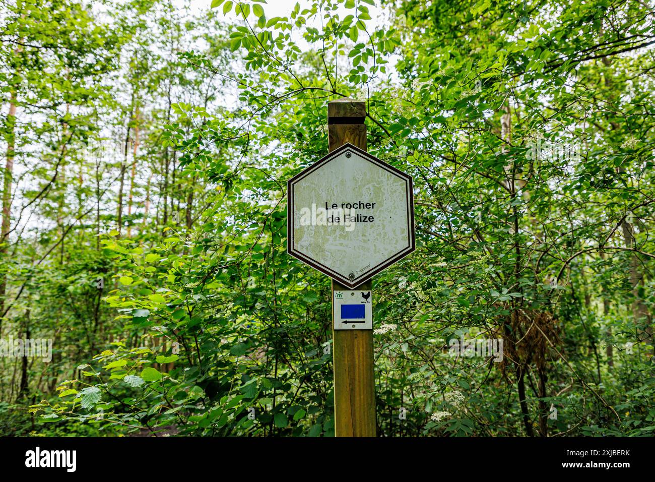 Wooden sign with name of place in French: Le Rocher de Falize which ...