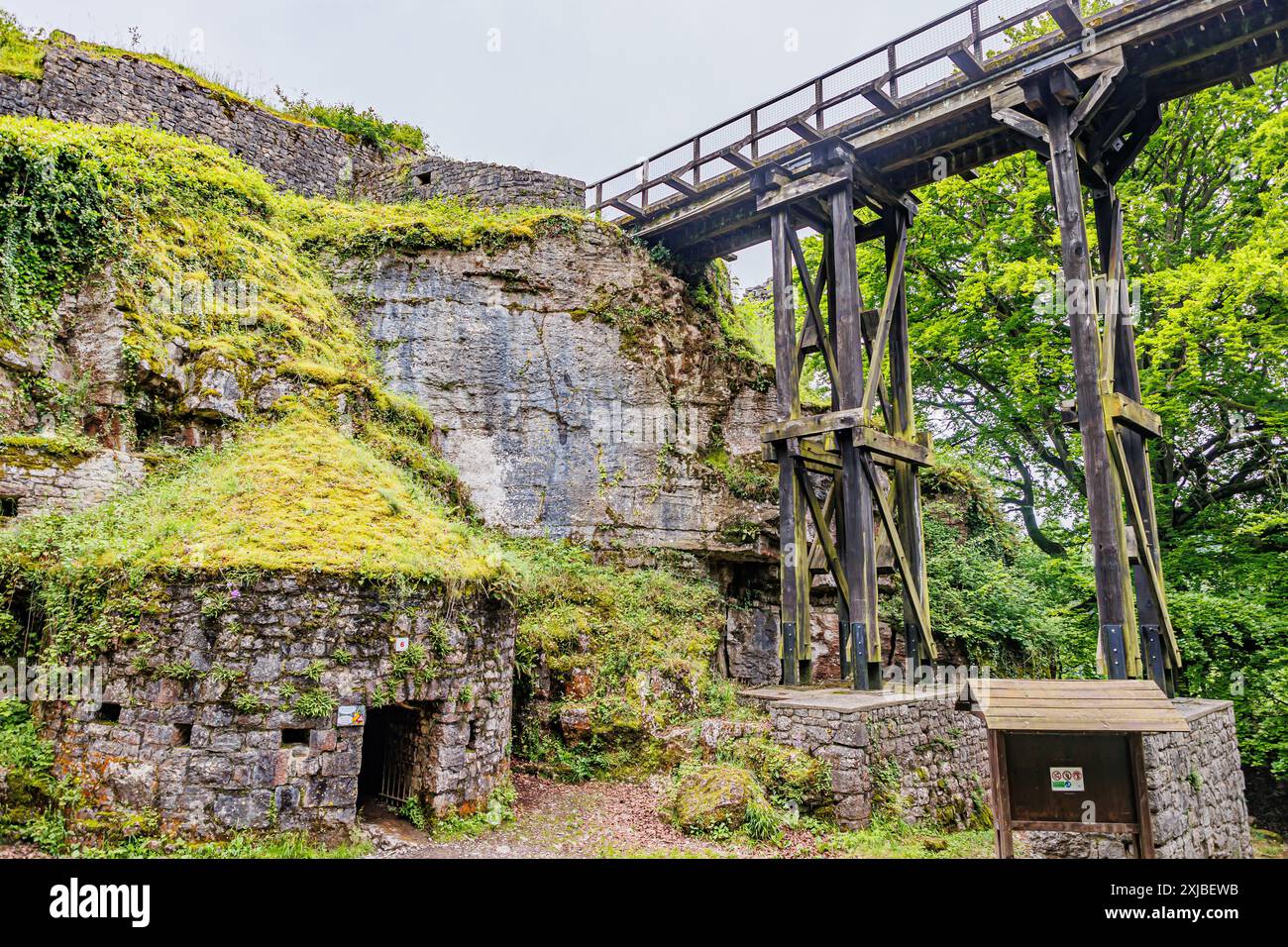Inner courtyard with an old small circular stone building next to a ...