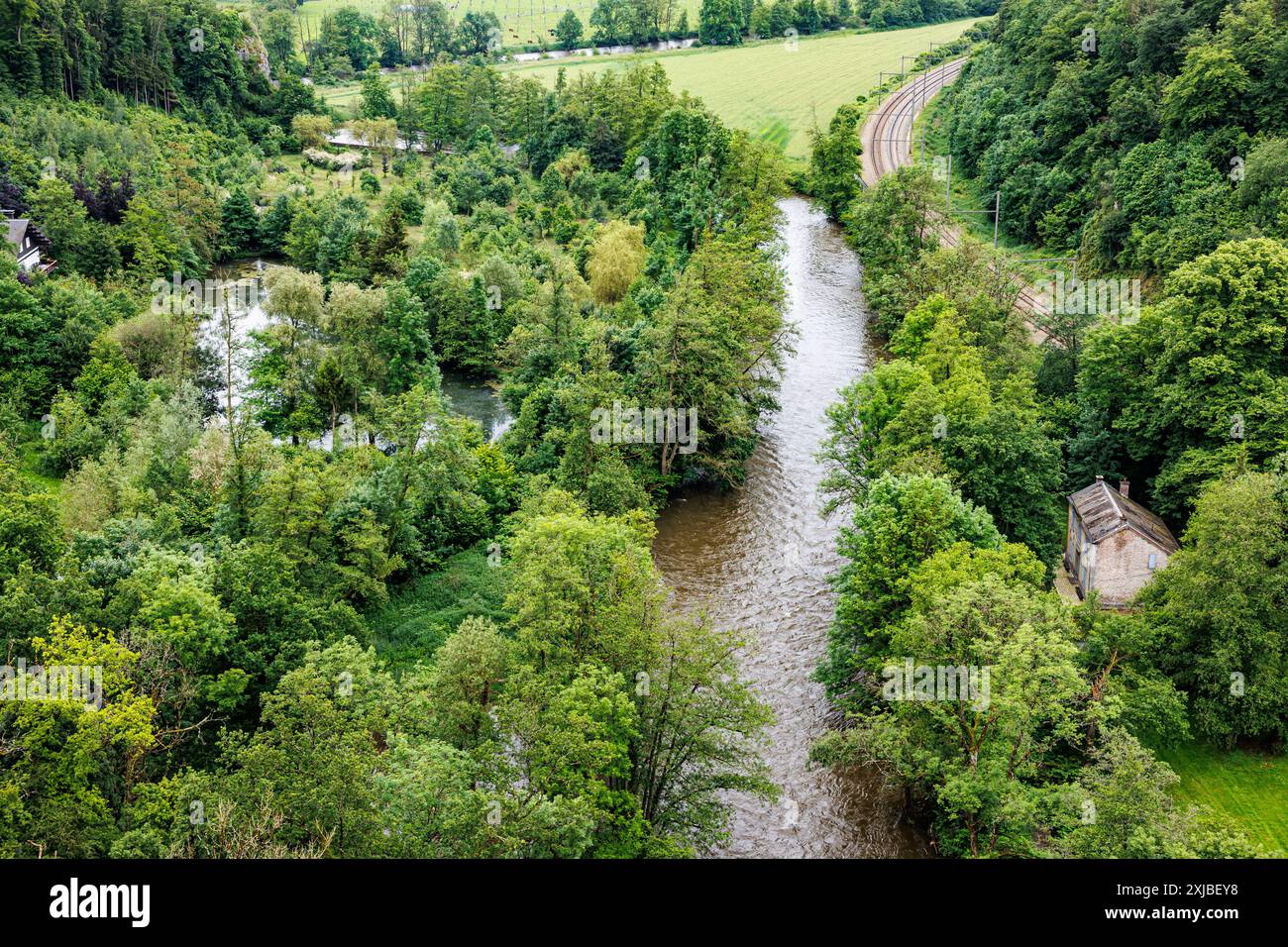 River Ourthe with abundant water slightly overflowing between abundant ...