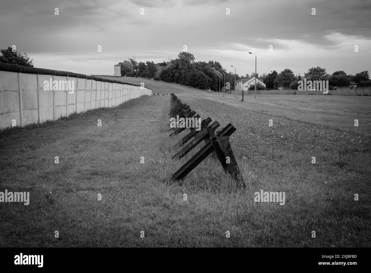 remains of the wall and anti-tank barriers still stand along the former ...