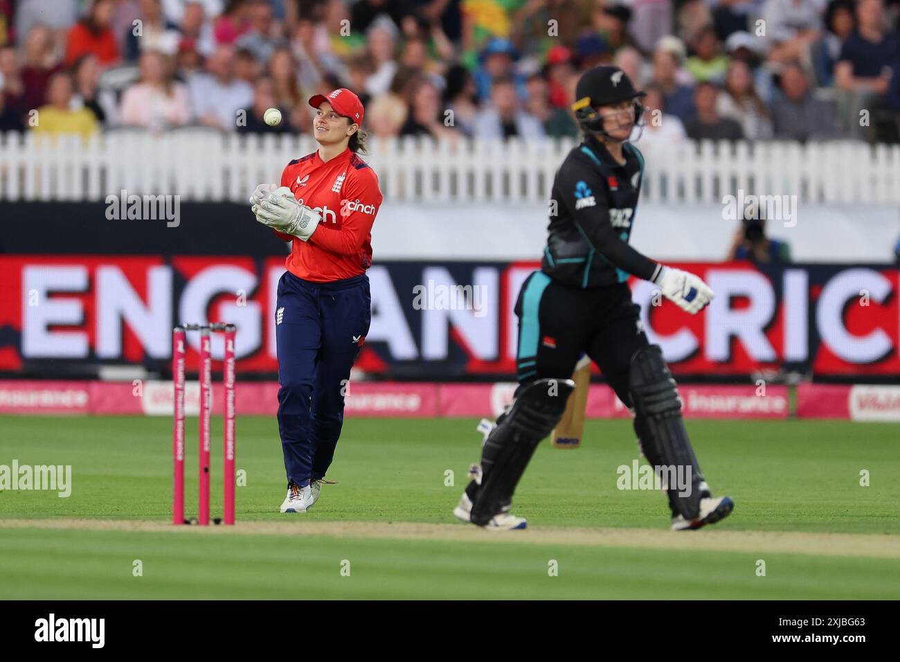 England's Amy Jones (left) celebrates after catching out New Zealand's ...