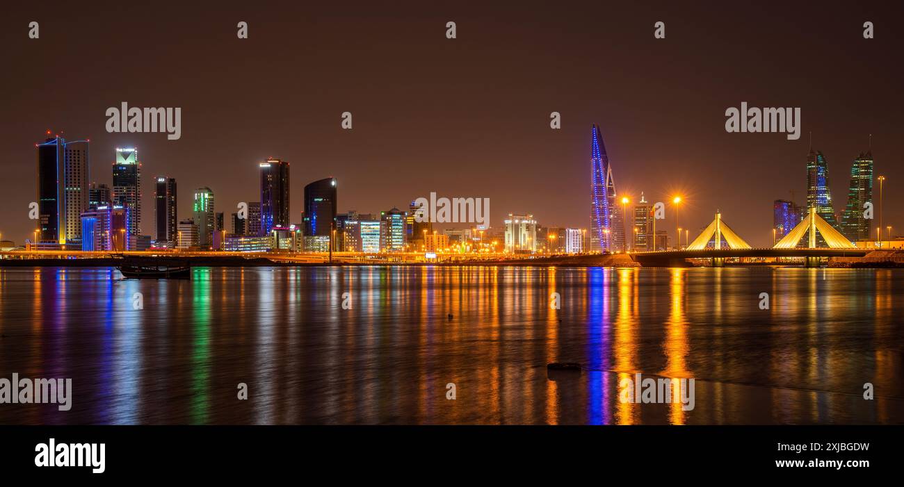 Manama, Bahrain at sunset showing megacity skyline, skyscrapers, modern ...