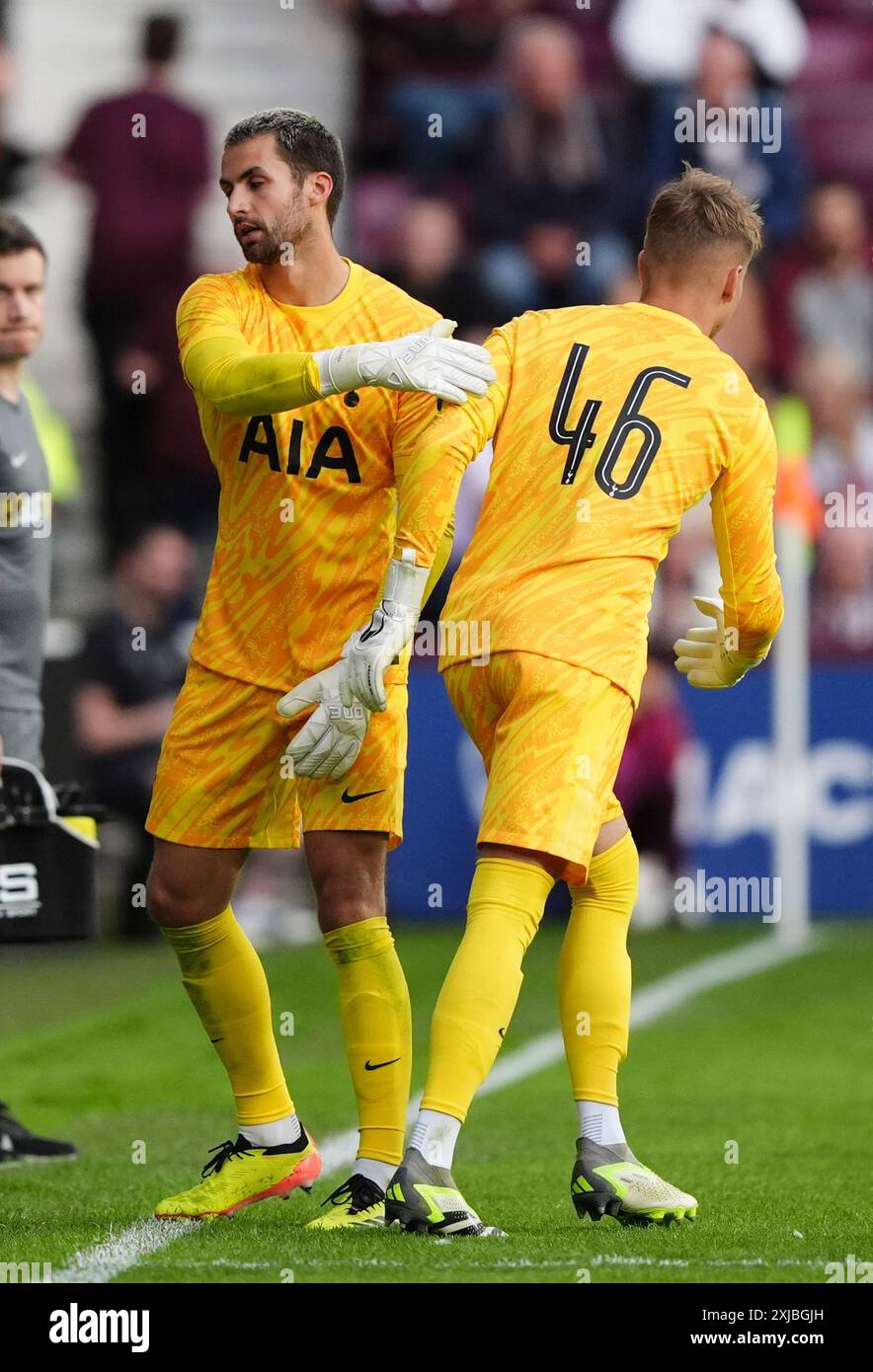 Tottenham Hotspur goalkeeper Alfie Whiteman (left) is replaced by Luca ...