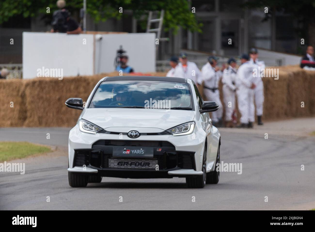 2024 Toyota GR Yaris car driving up the hill climb track at the Goodwood Festival of Speed 2024 ...