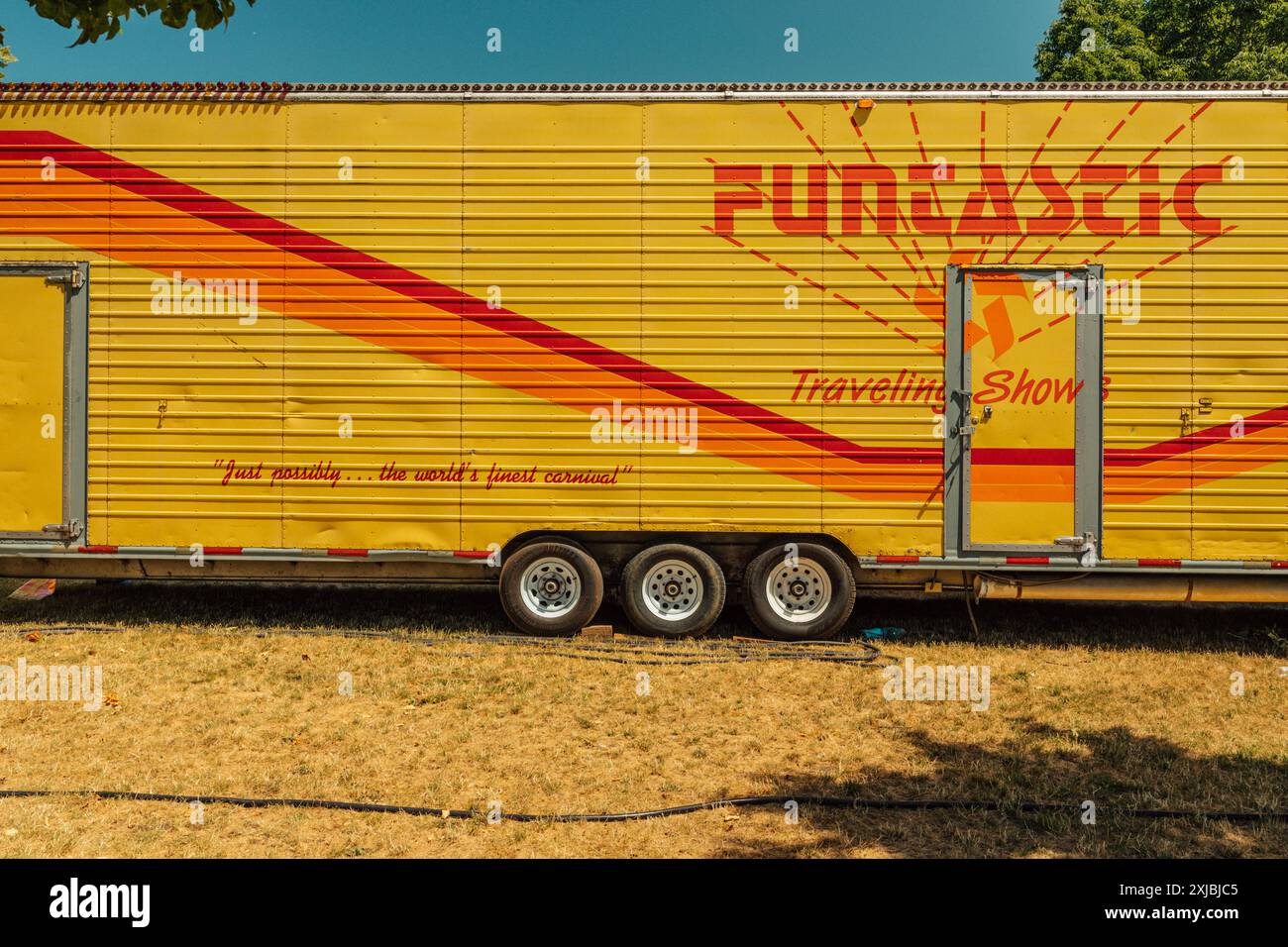 yellow Funtastic traveling show trailer with tagline "just possibly ...