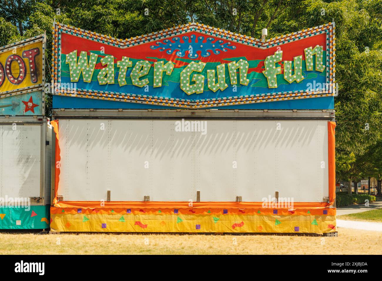 Water Gun Fun facade at amusement park, summer fair Stock Photo - Alamy