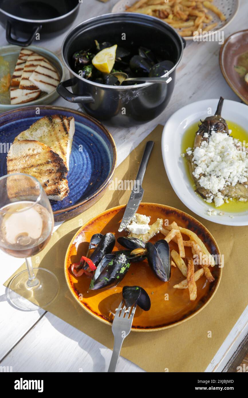 Various Mediterranean dishes served on the restaurant table Stock Photo ...