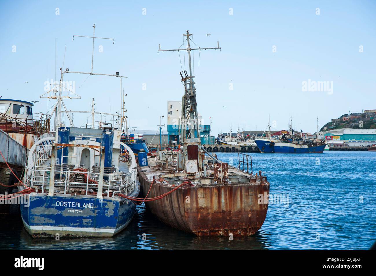 Old and rusted boats docked in Hout Bay port, Cape Town, South Africa ...