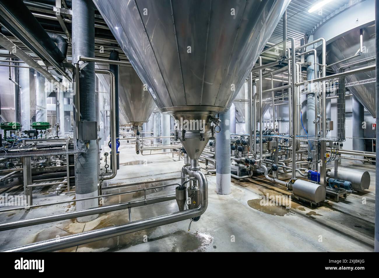 Large industrial stainless steel vats for fermentation in modern ...