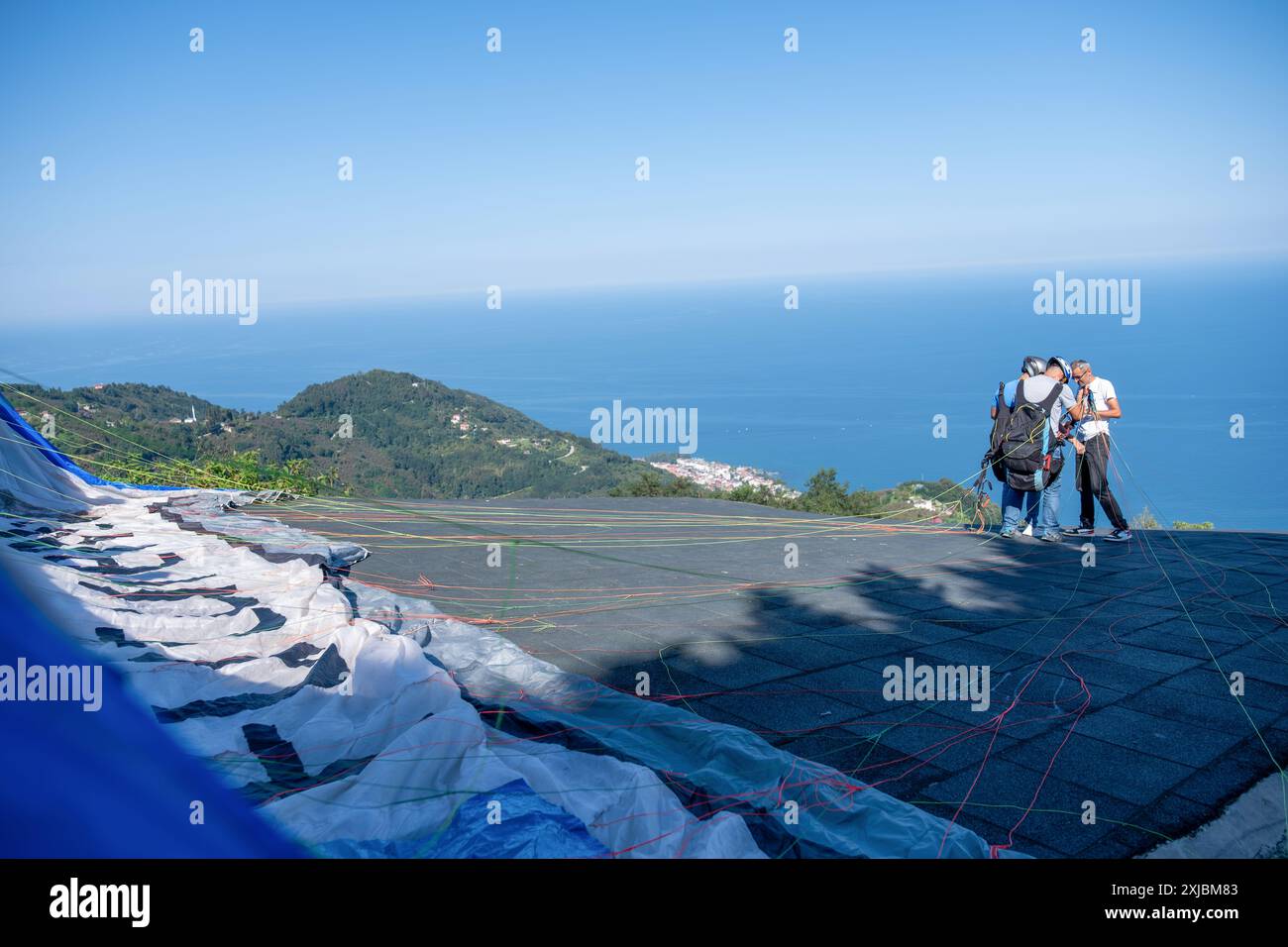 Paraglider Parachute Take Off Cliff Stock Photo - Alamy