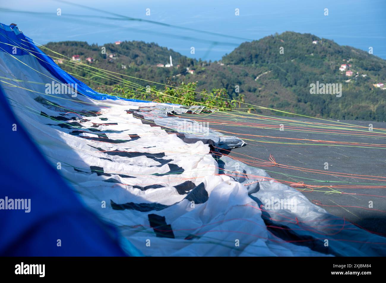 Paraglider Parachute Take Off Cliff showing how many strings attached ...