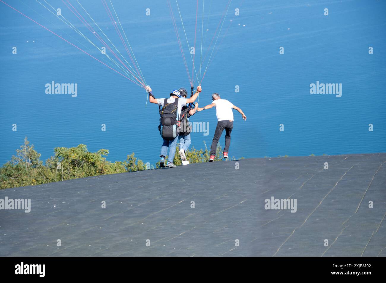 Paraglider Parachute Take Off Cliff Stock Photo - Alamy