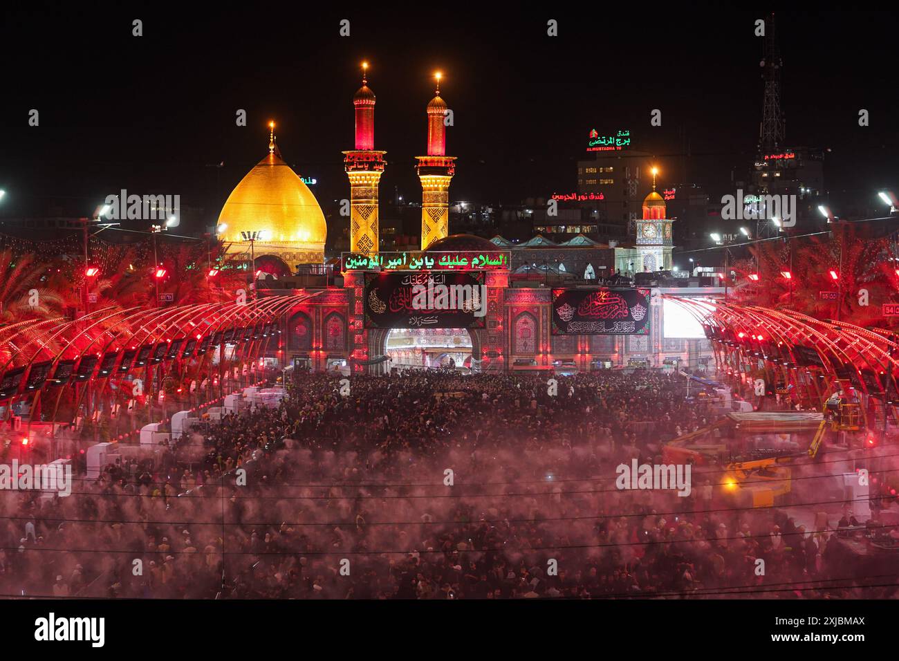 Shiite Muslims take part in the mourning rituals during a religious ...